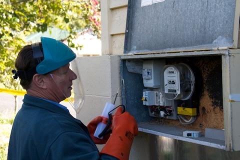 Removing a small package electrical switchboard | Asbestos